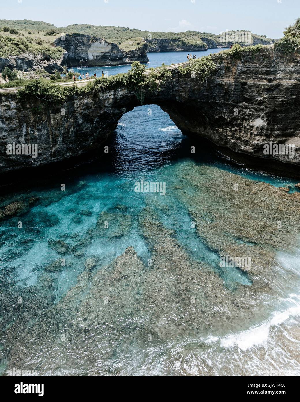 View of the turquoise and paradise sea from the cliff. Rocks and ...