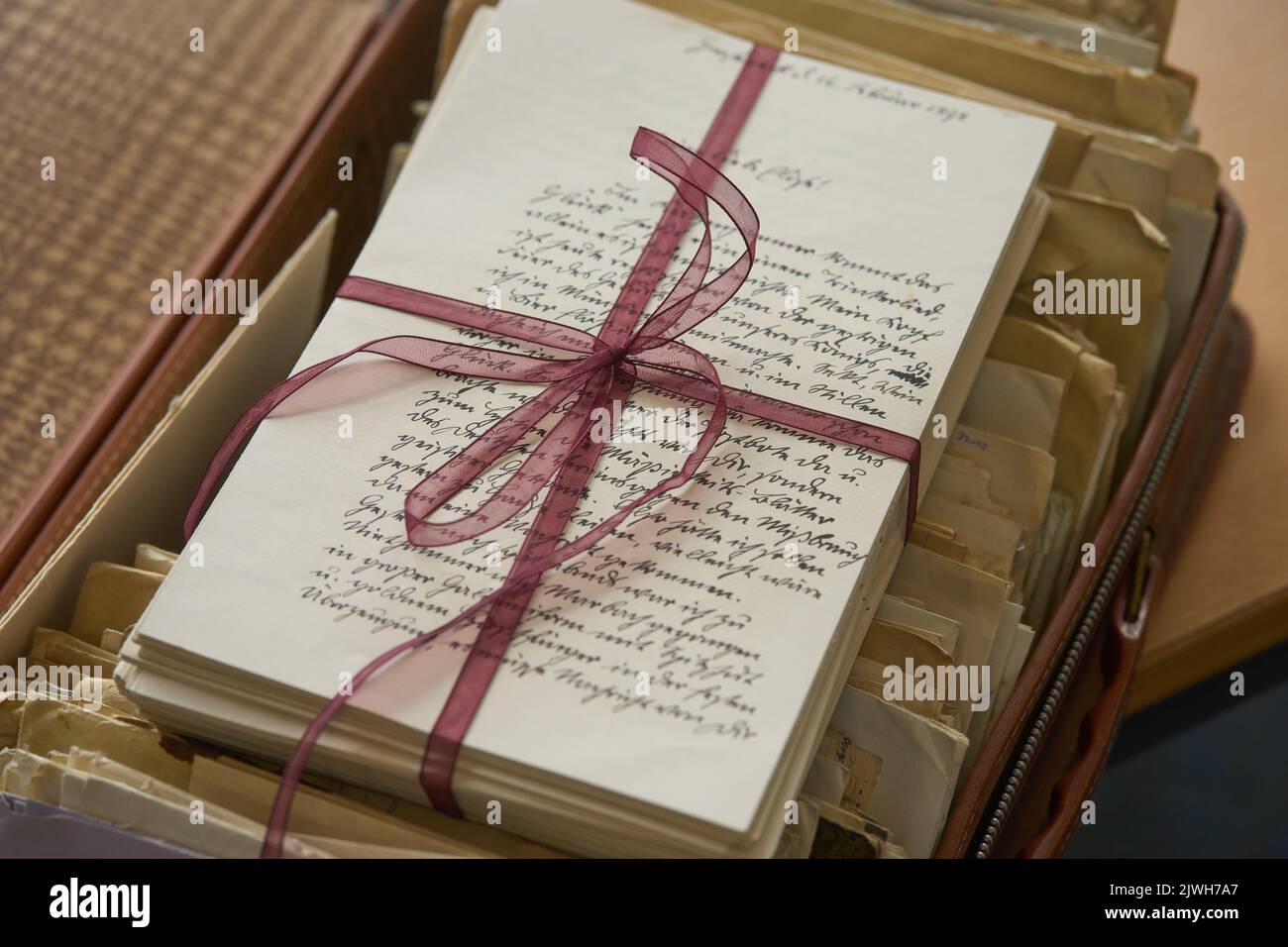 Koblenz, Germany. 05th Sep, 2022. A red ribbon holds love letters from ...