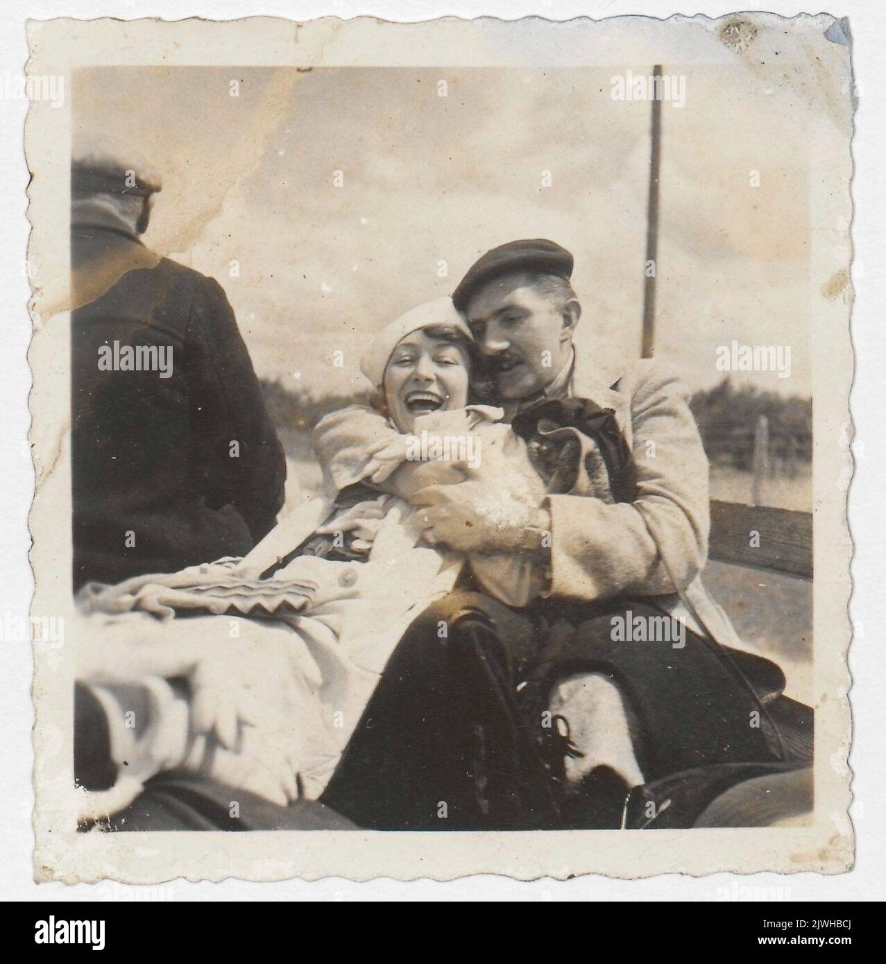 Olga Niewska with unknown man, on a fire engine (?).. unknown ...