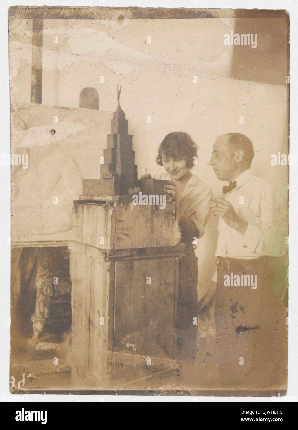 Olga Niewska in the company of a man at the sculptor's workshop, with ...