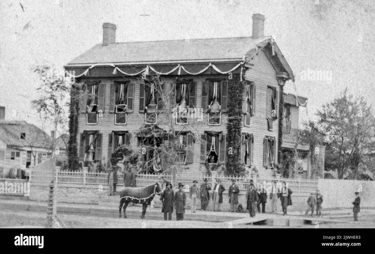 Lincoln's house draped in mourning with his horse "Old Robin" in front ...
