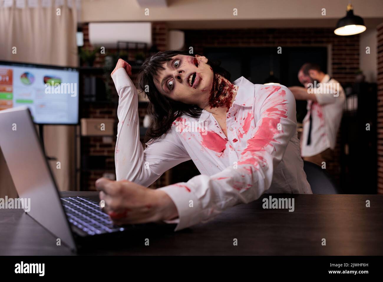 Zombie woman eating hi-res stock photography and images - Alamy
