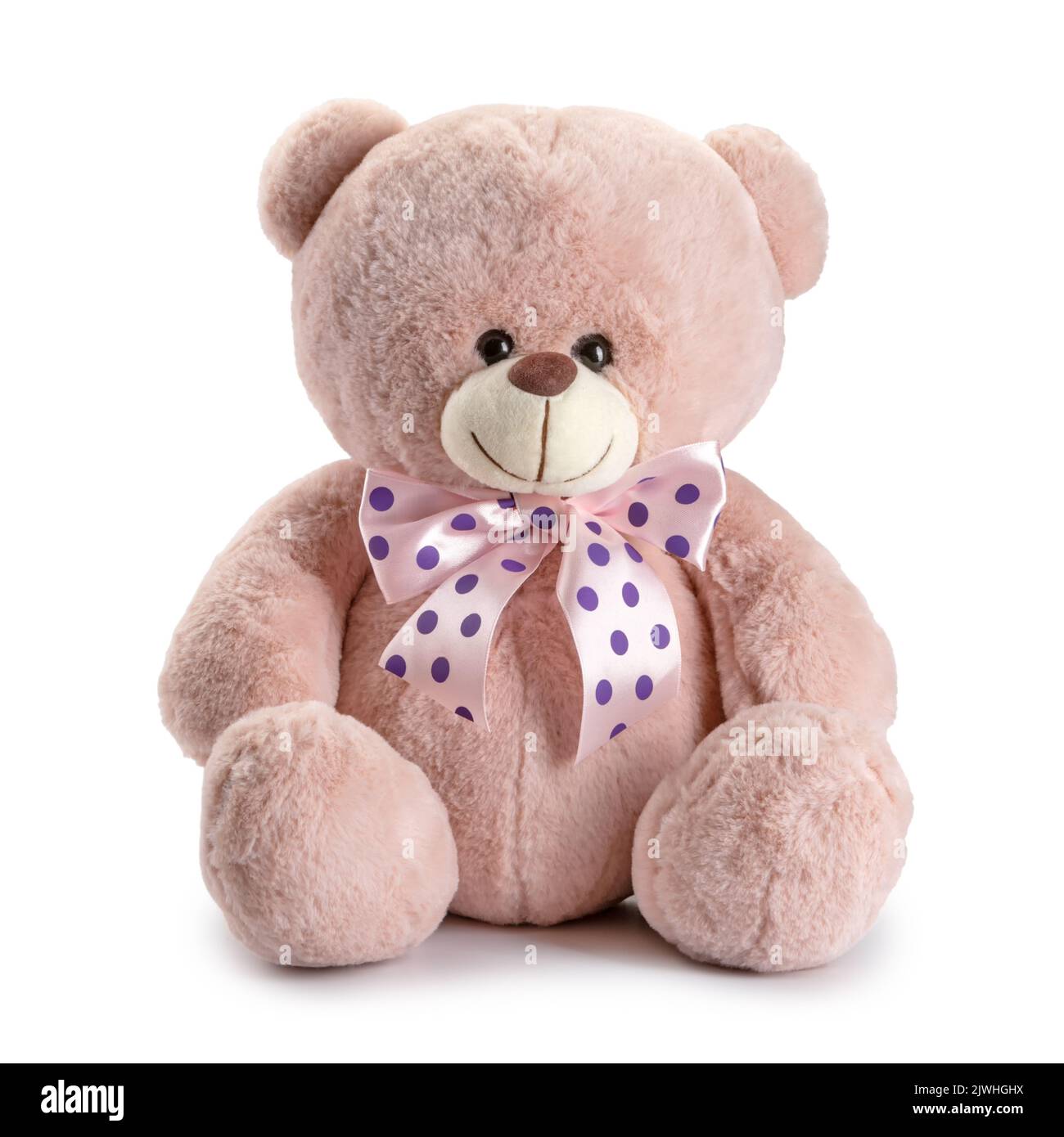 Children's toy teddy bear with pink bows in dots isolated Stock Photo ...