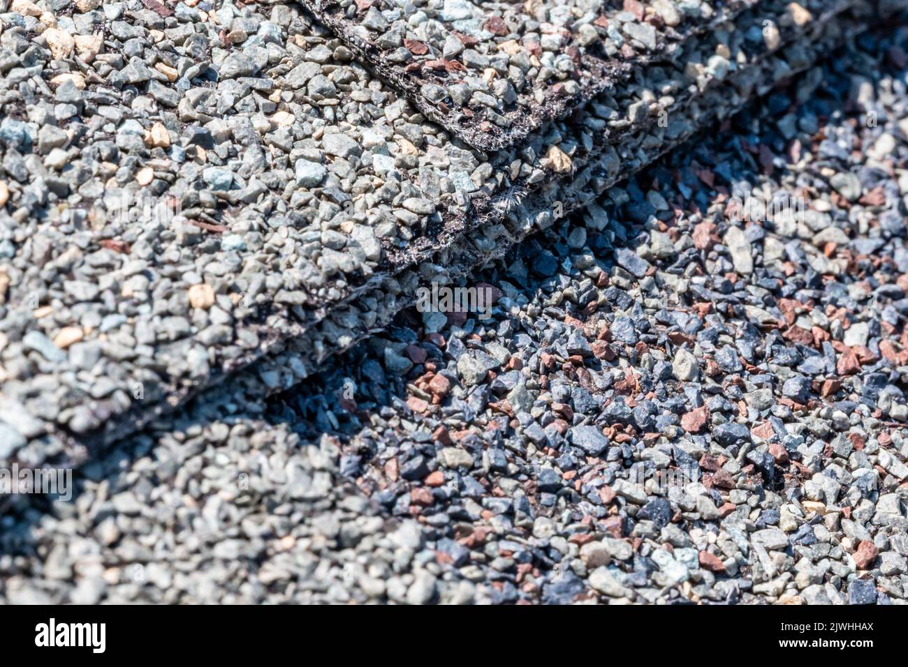 Macro of asphalt shingle layered seam on a residential house Stock ...
