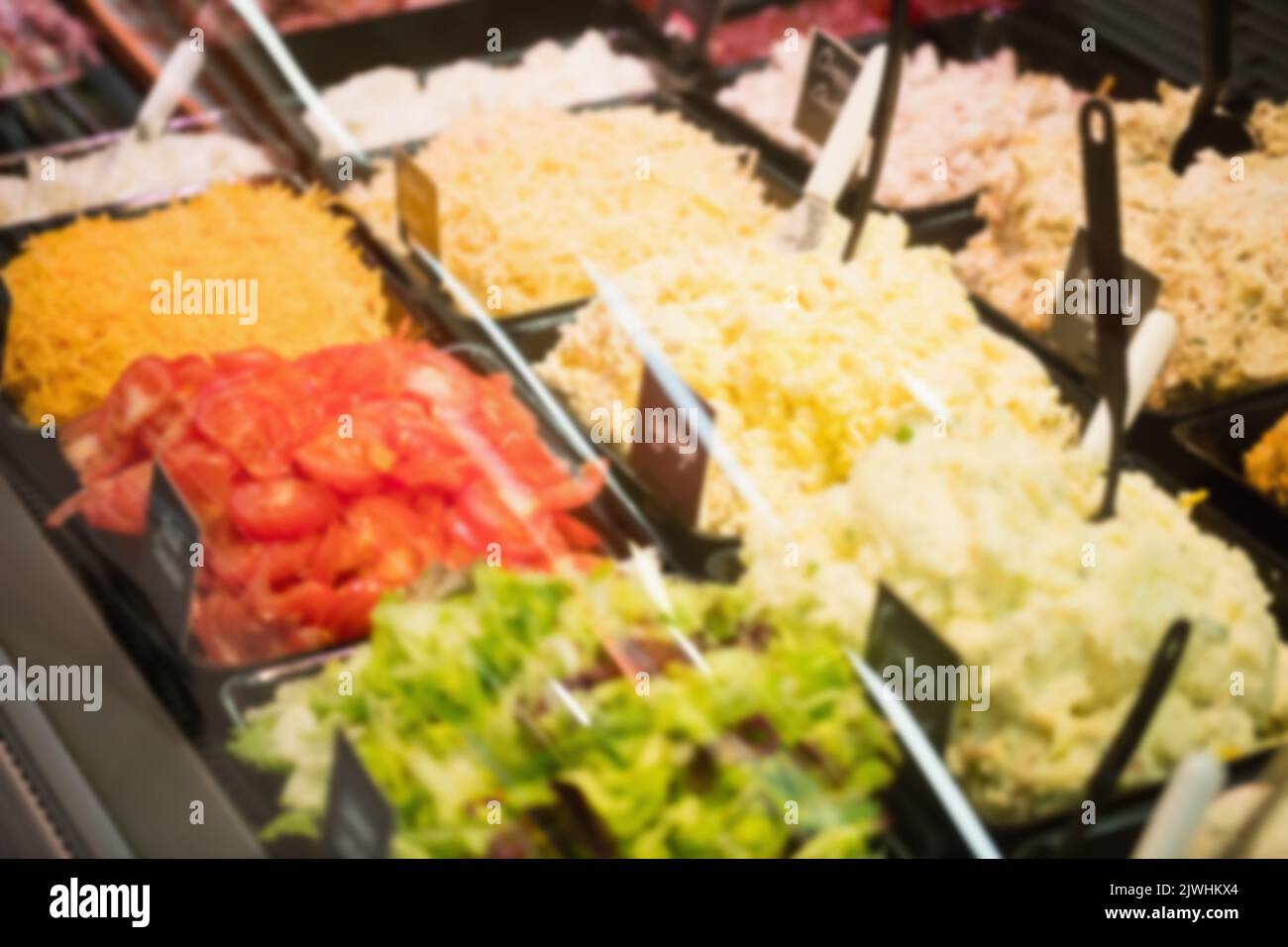 Varieties of salad on display for sale at supermarket Stock Photo - Alamy