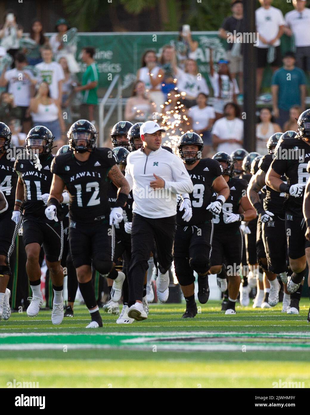 September 3, 2022 - Hawaii Rainbow Warriors head coach Timmy Chang runs ...