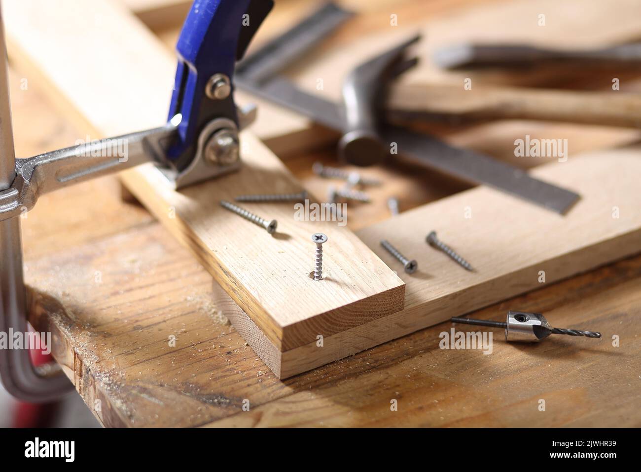 Driving screws into a wooden frame with an Driving screws into a wooden ...