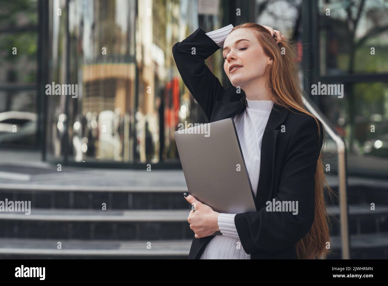 Pretty secretary in office carrying hi-res stock photography and images ...