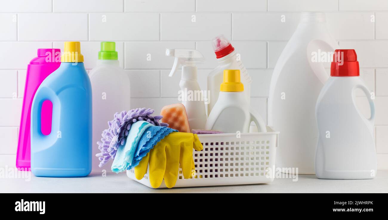 A set of different detergents, sponges and rags. The concept of ...