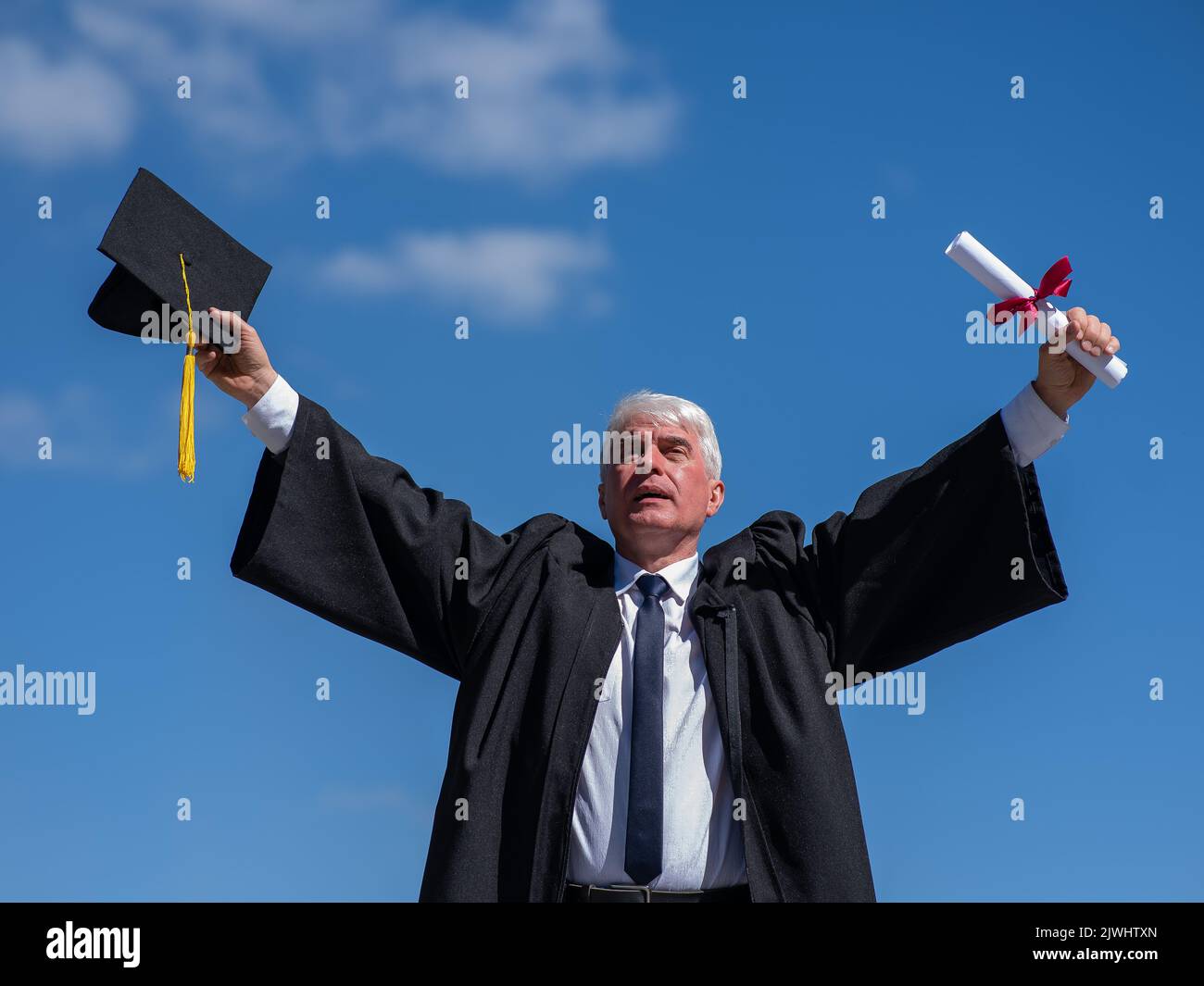 College student receiving diploma hi-res stock photography and images ...