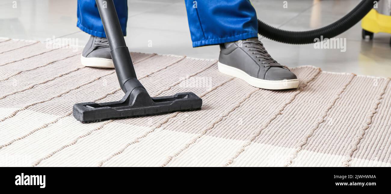 Man hoovering room hi-res stock photography and images - Alamy