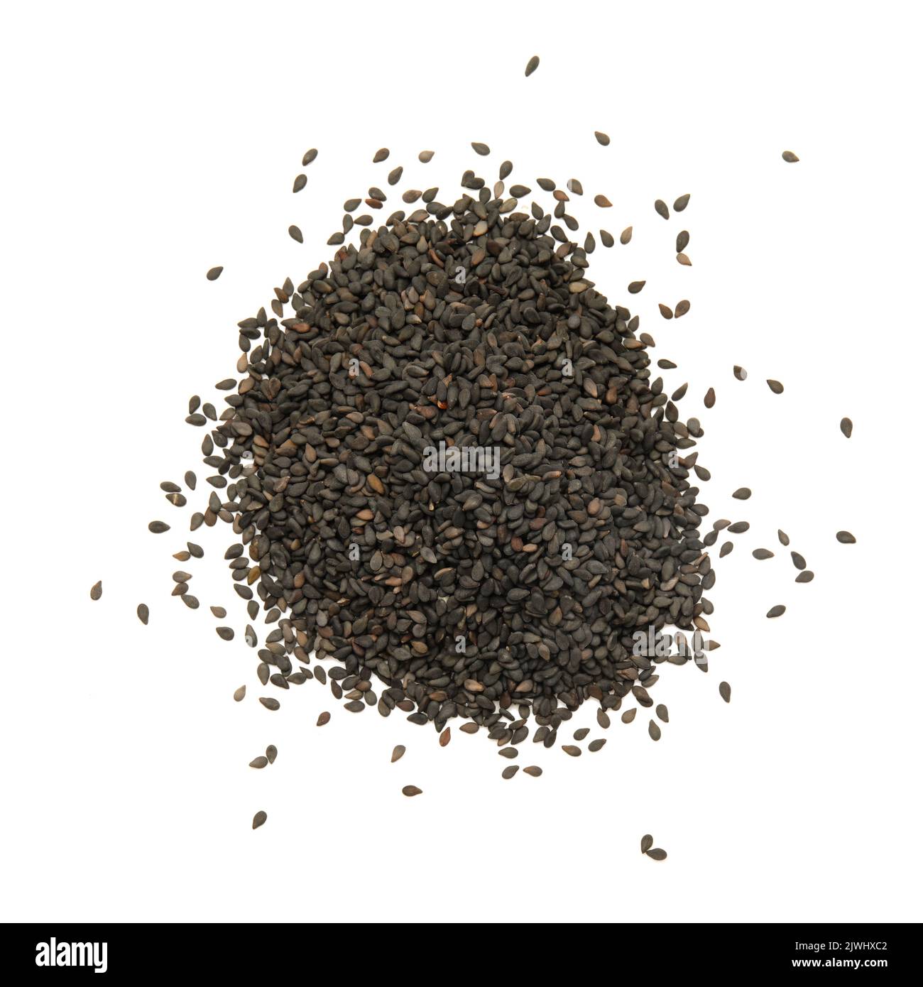 Heap of black sesame seeds isolated on white background Stock Photo - Alamy