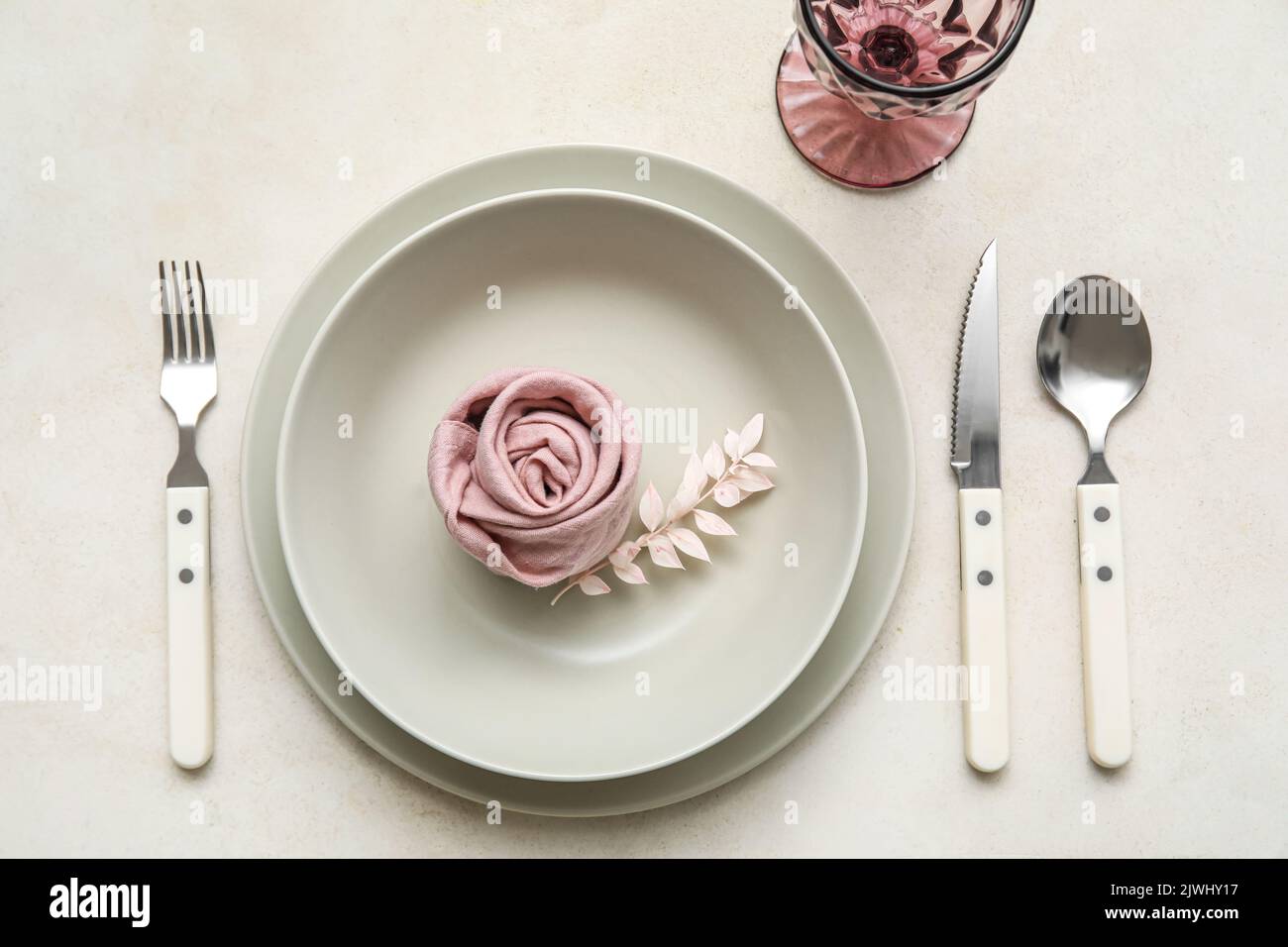 Simple table setting with beautiful decor on light background Stock ...