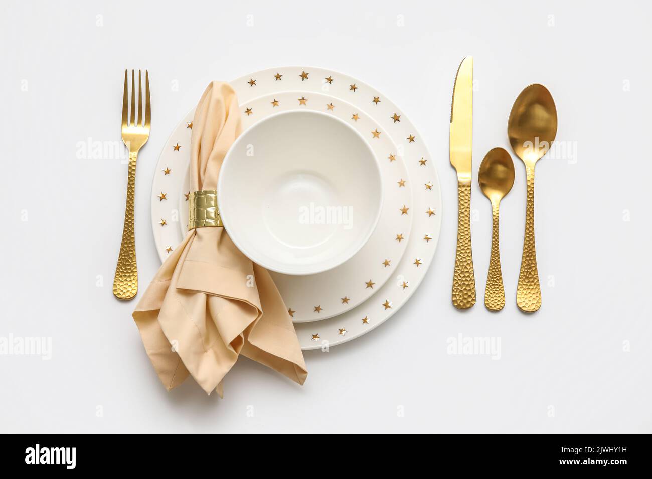Stylish table setting with plates, napkin and cutlery on white ...