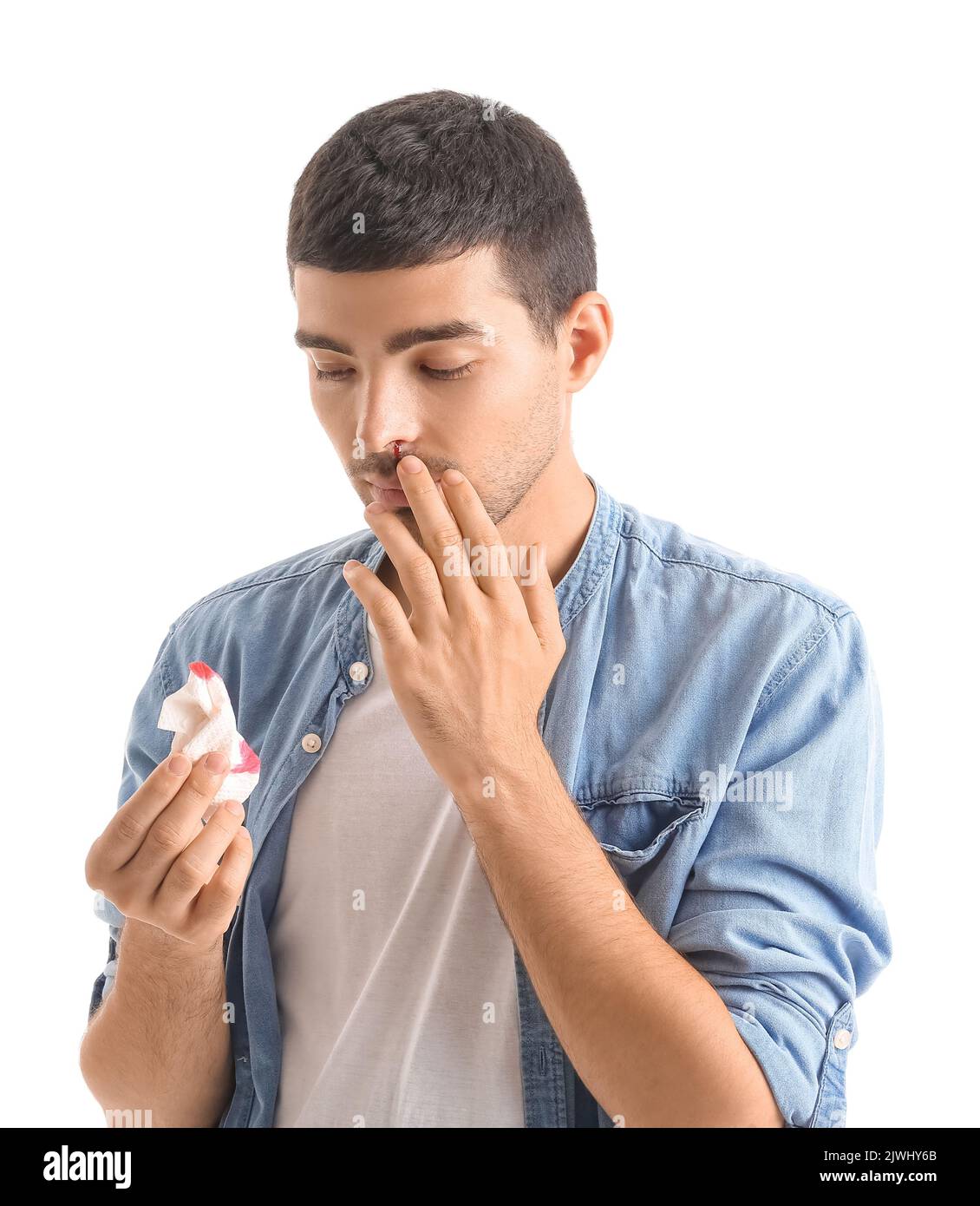 Young man nosebleed tissue hi-res stock photography and images - Alamy