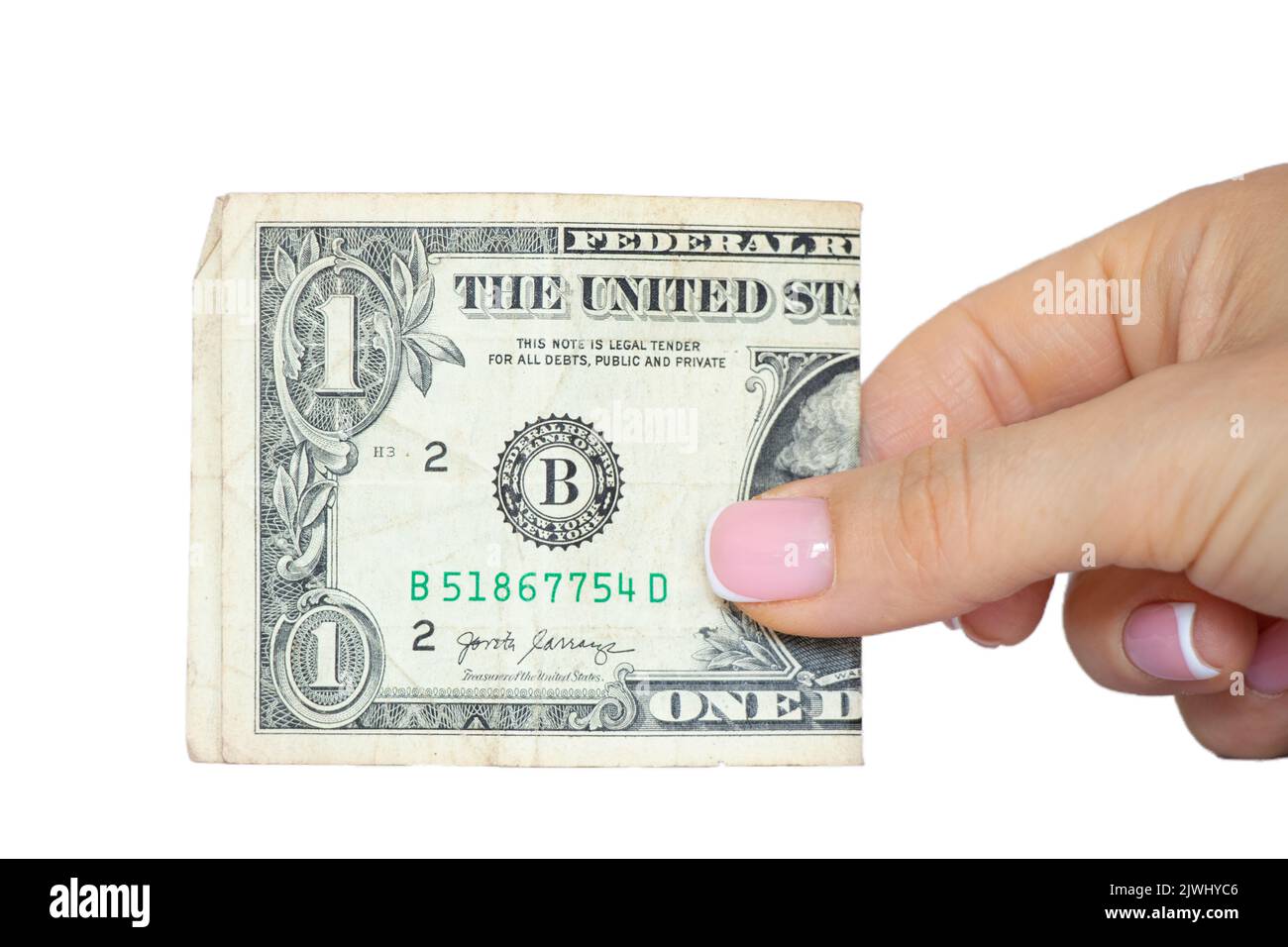 Woman's hand holds one dollars on a white background ,business and ...