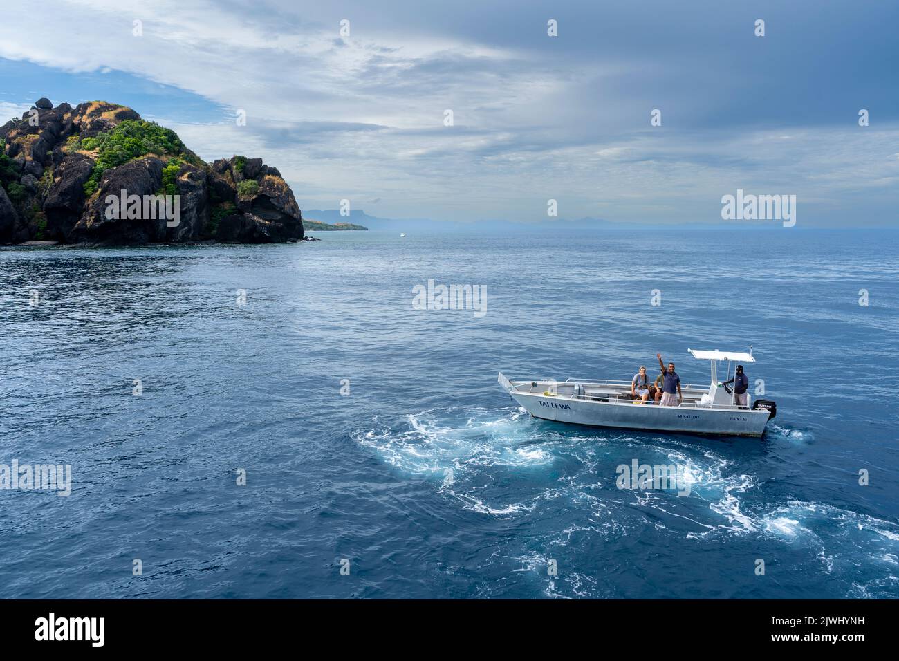 Small boat transporting tourists from the Yasawa Flyer Island Ferry to ...