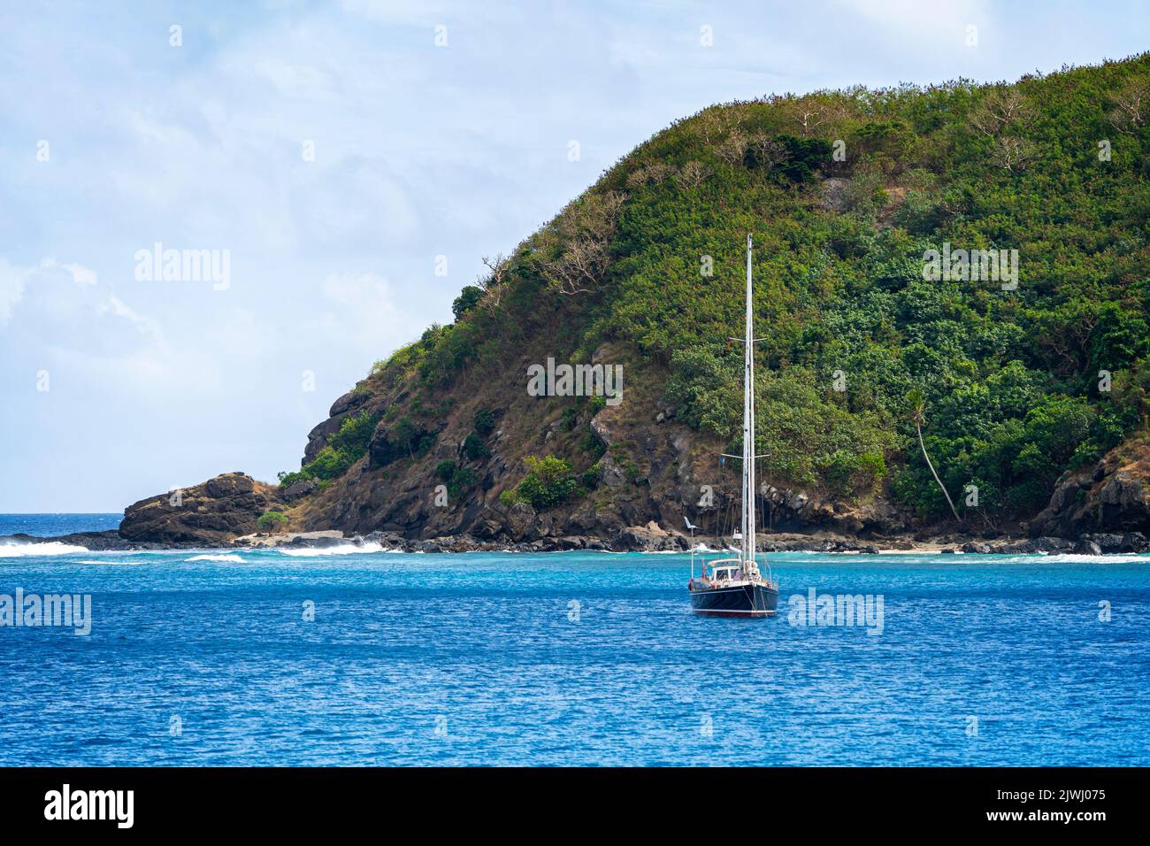 Yacht anchored of tropical island, Yasawa Islands, Fiji Stock Photo - Alamy