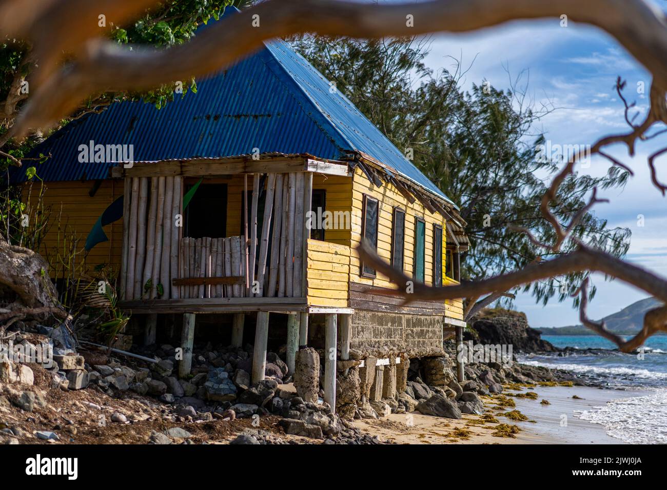 Yellow bungalows at family run homestay in village on Nanuya LaiLai ...