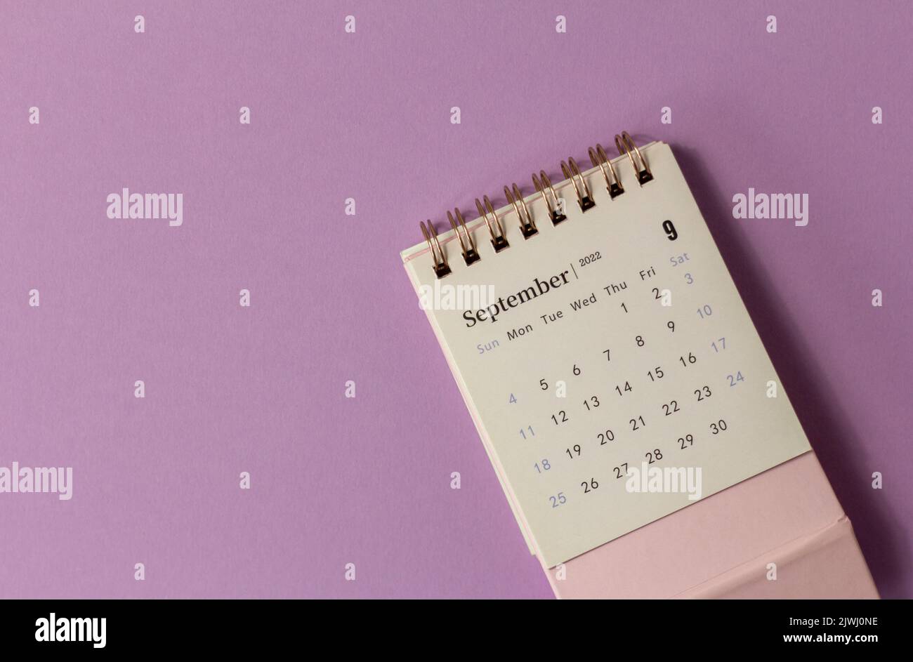 Desktop calendar for September 2022 on a lilac background Stock Photo ...