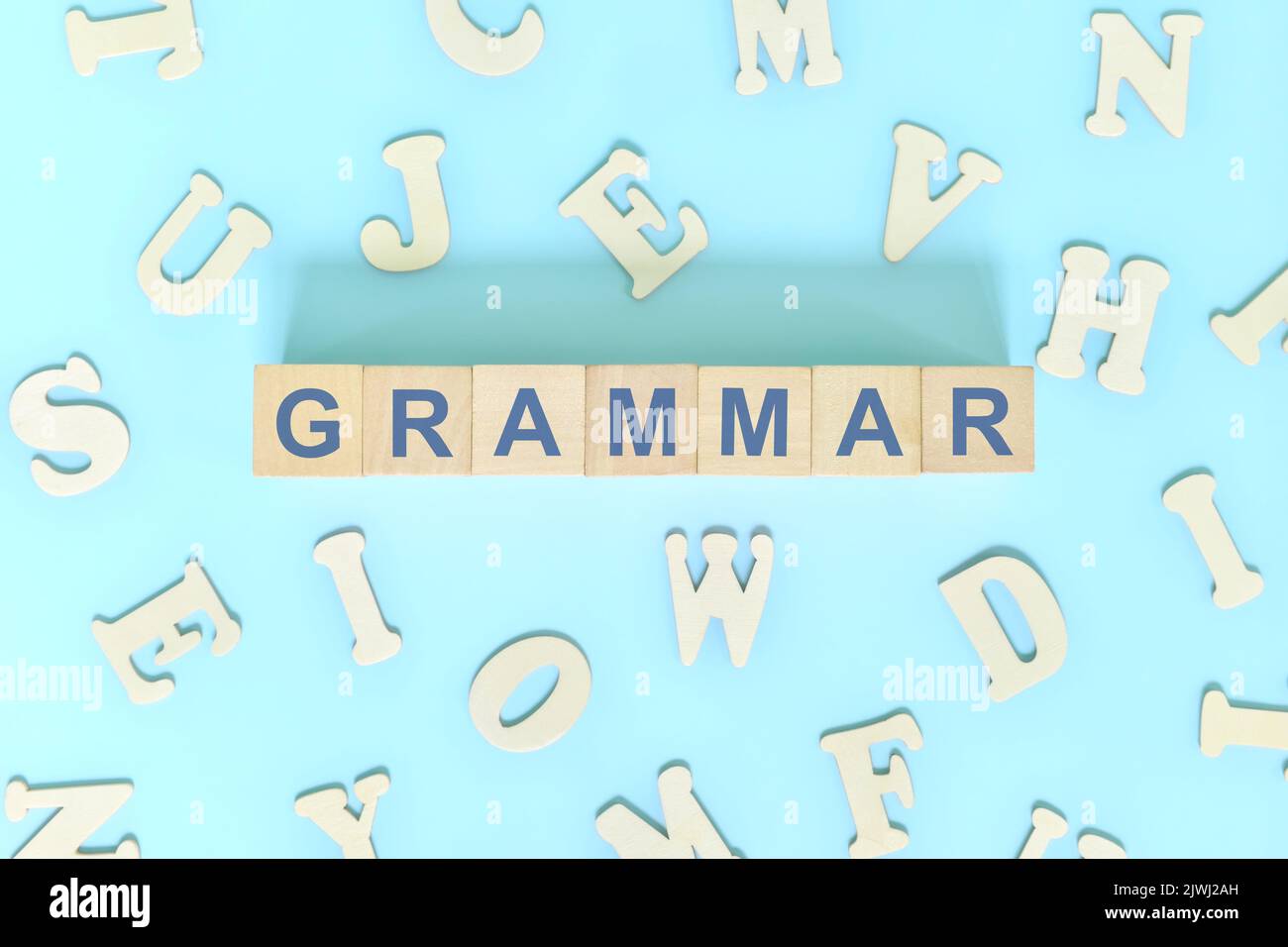 English grammar and learning class lesson. Wooden blocks typography ...