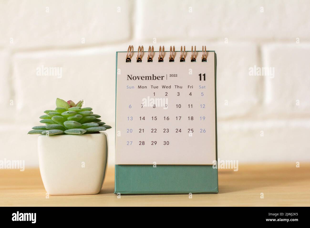 Desktop calendar for November 2022 on the table Stock Photo - Alamy