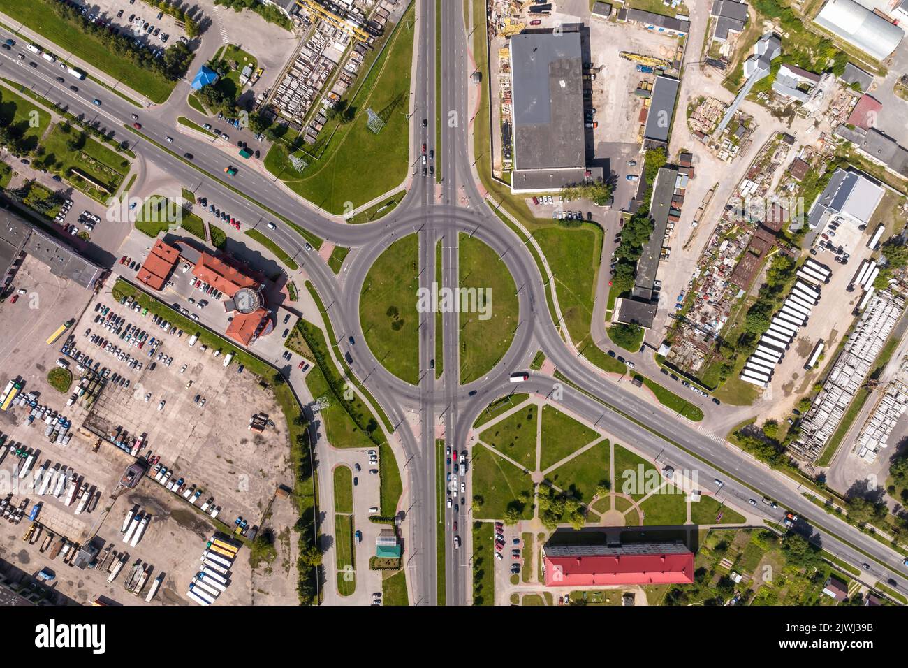 aerial view of huge road junction of freeway with heavy traffic at city ...
