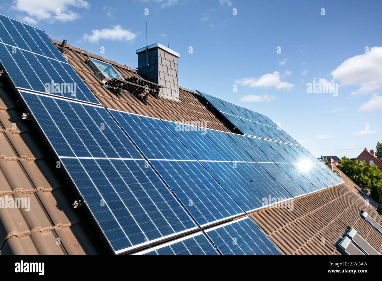 Photovoltaic system on a roof of a sustainable family home Stock Photo ...
