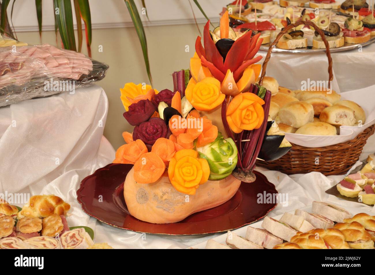 A food art decoration at the center of a buffet table at a party Stock ...