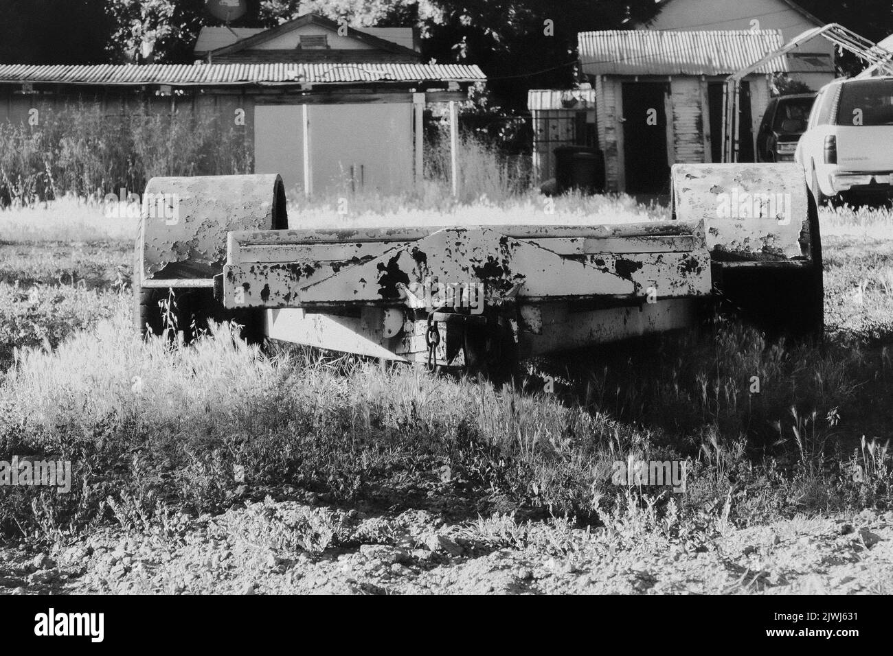 A monochrome shot of the old tractor trailer Stock Photo - Alamy