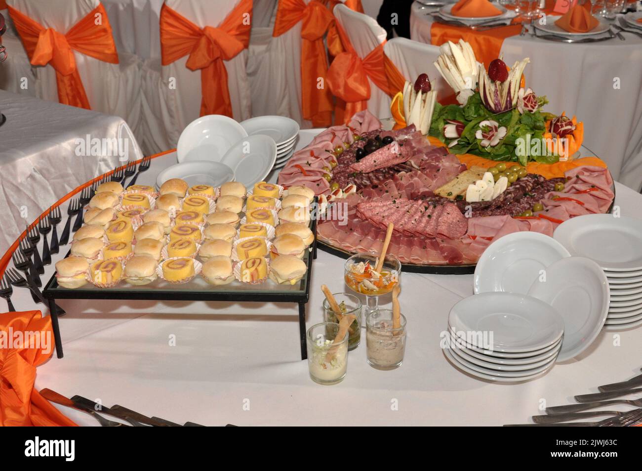 A bunch of bread and meat appetizers on a buffet table at a party Stock ...