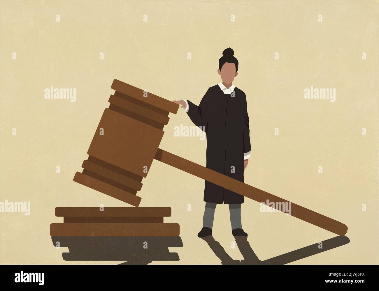 Female judge standing at large gavel Stock Photo - Alamy
