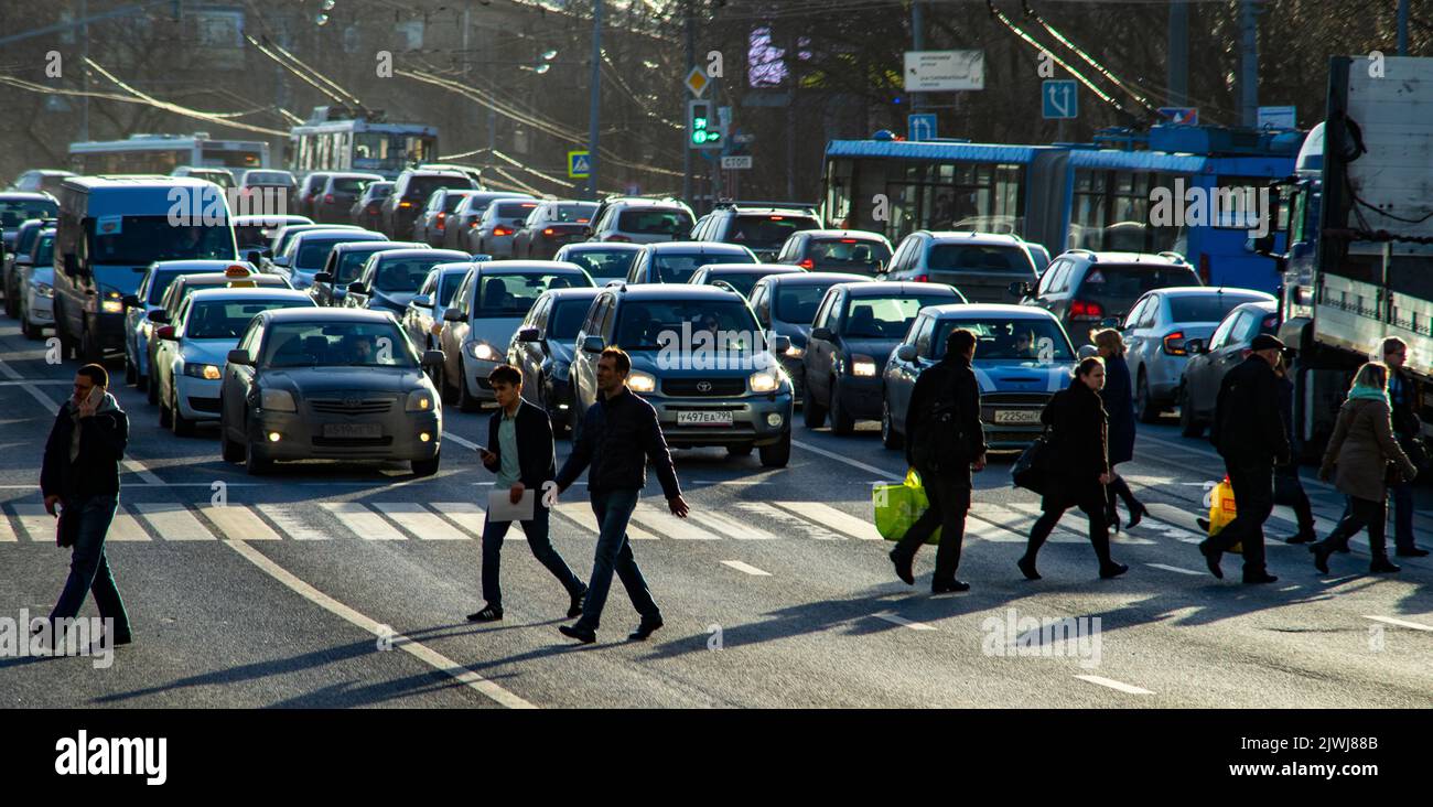 April 9, 2018, Moscow, Russia. Pedestrians cross the street at a ...