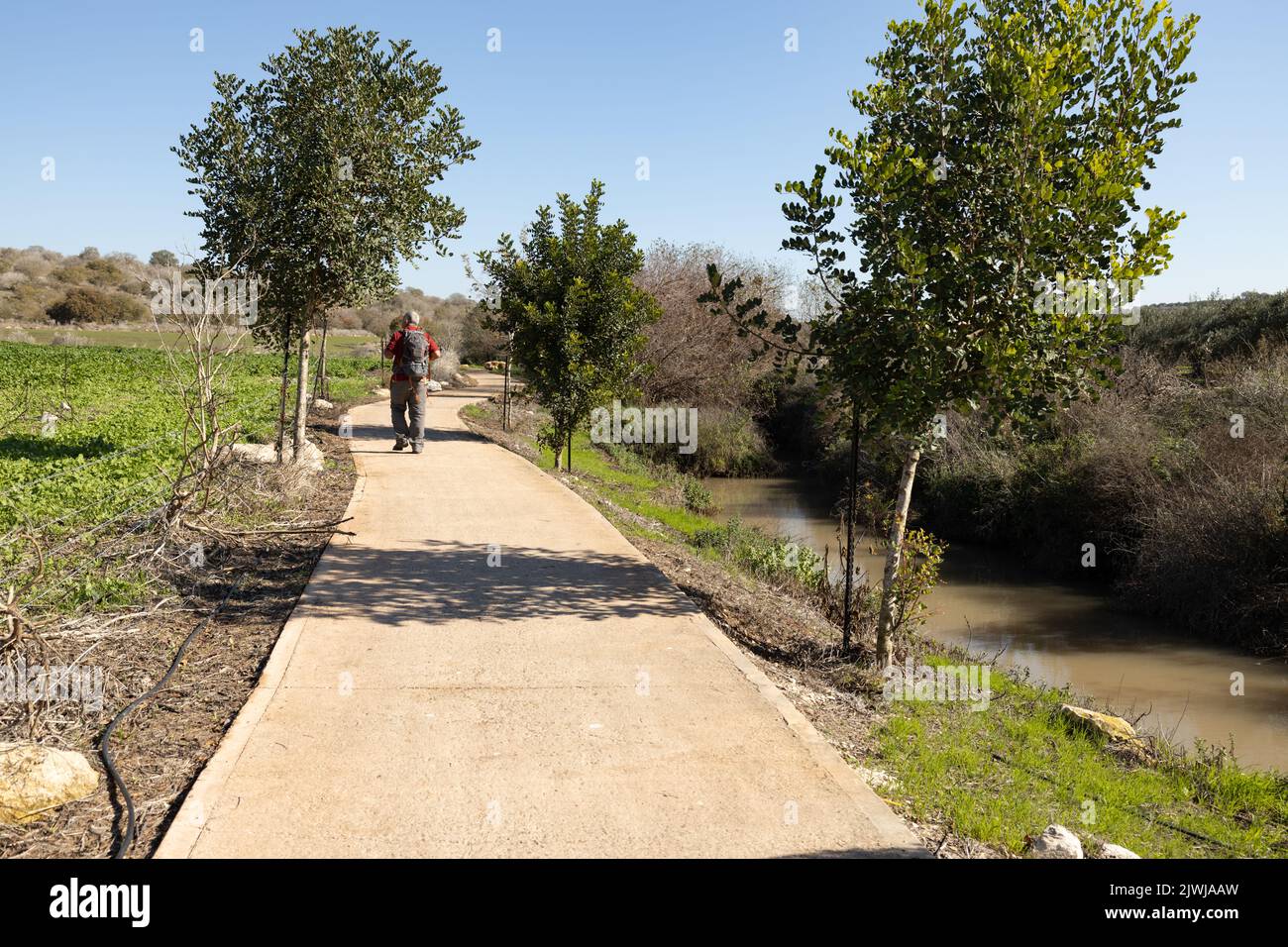A hiker walking on the park trail in Tzipori river park, Lower Galilee ...