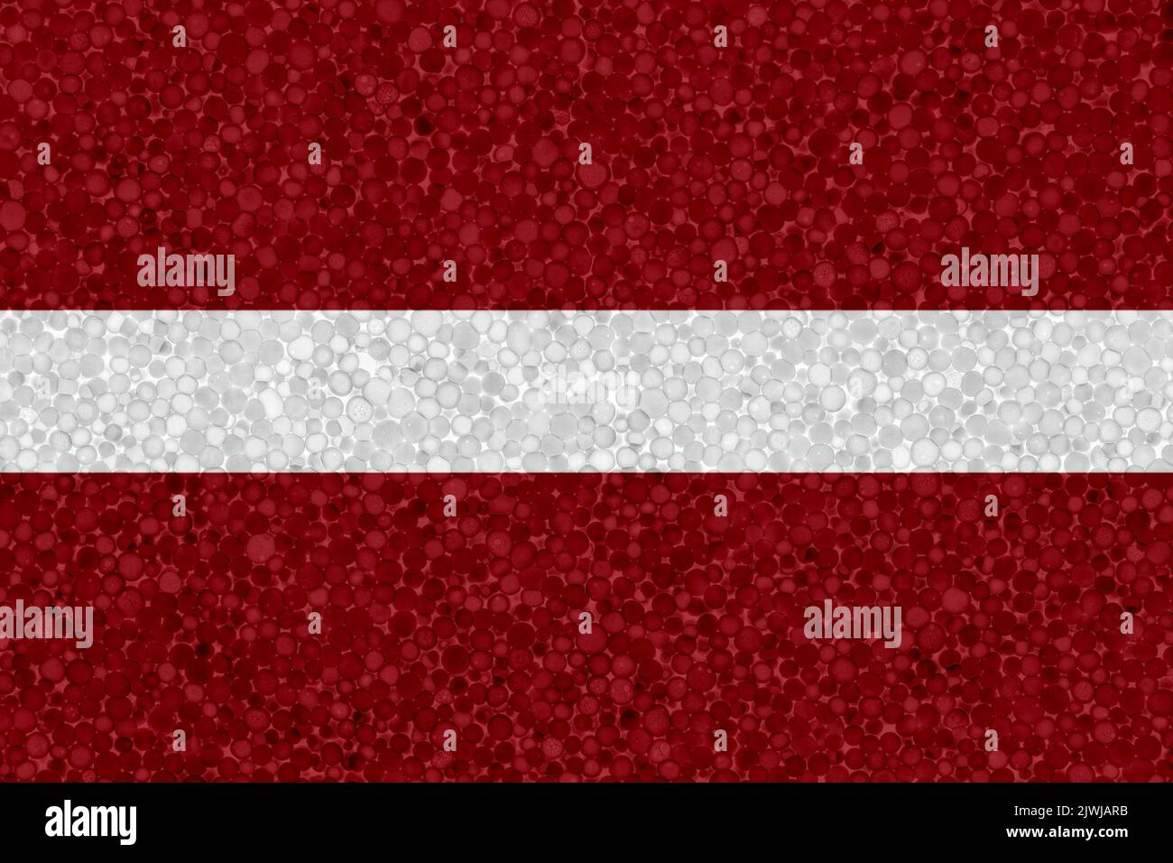 Flag of Latvia on styrofoam texture. national flag painted on the ...