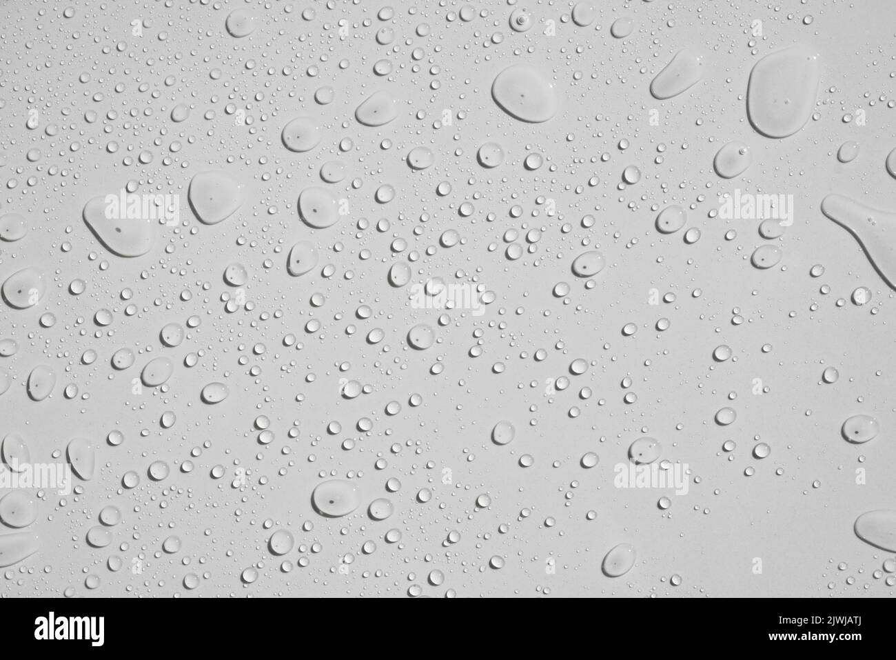 Water droplets on white tile Stock Photo - Alamy