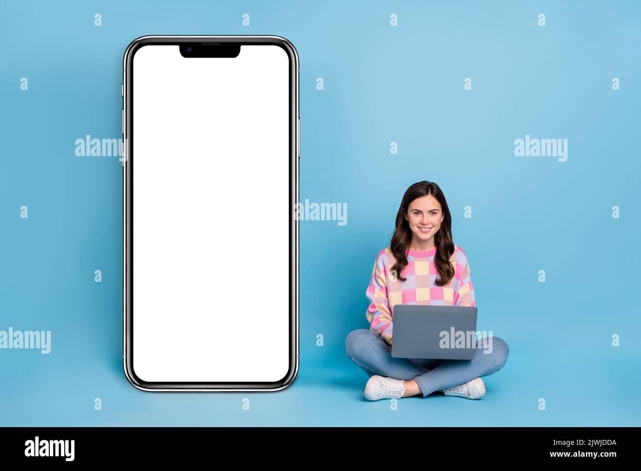 Full body photo of young cheerful girl agent use laptop promotion sit ...