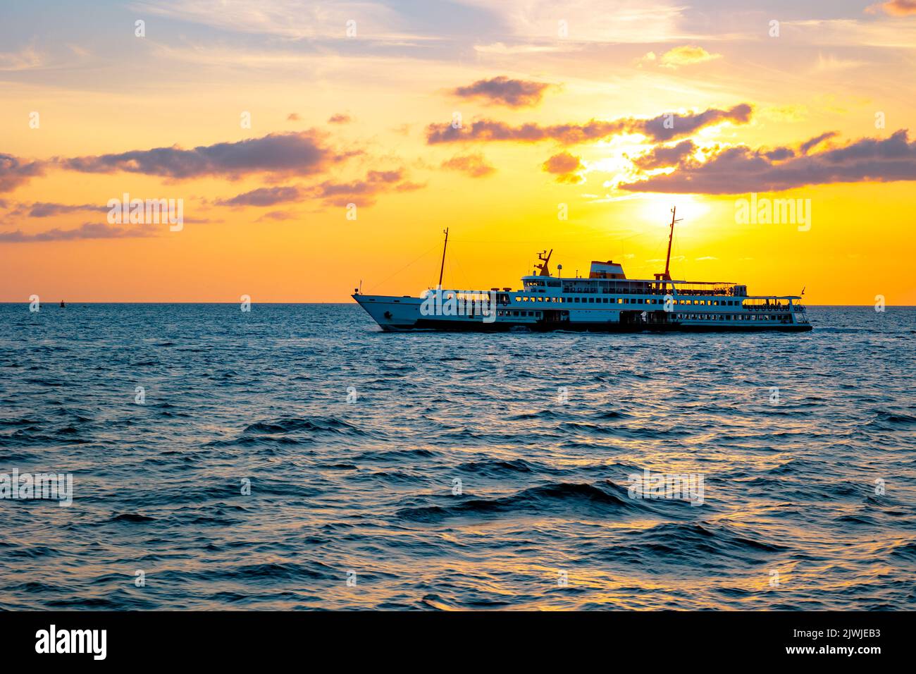 Famous ferry of Istanbul on the sea at sunset. Travel to Istanbul ...