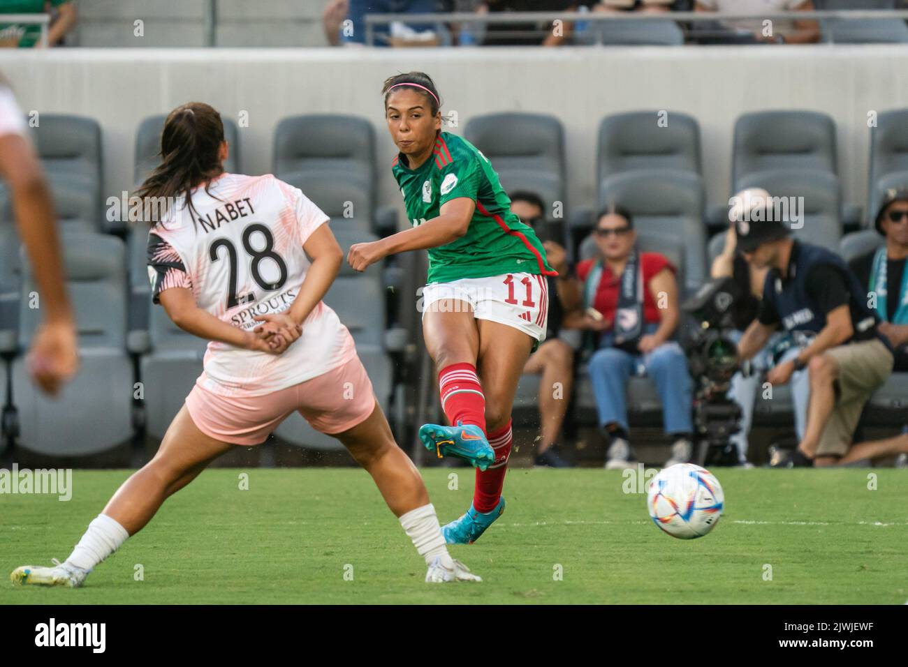 Mexico midfielder Maria Sanchez (11) sends a pass past Angel City FC ...