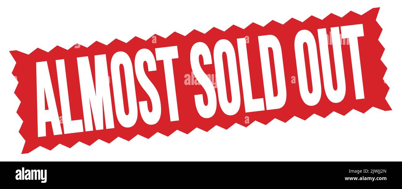 ALMOST SOLD OUT text written on red zig-zag stamp sign Stock Photo - Alamy