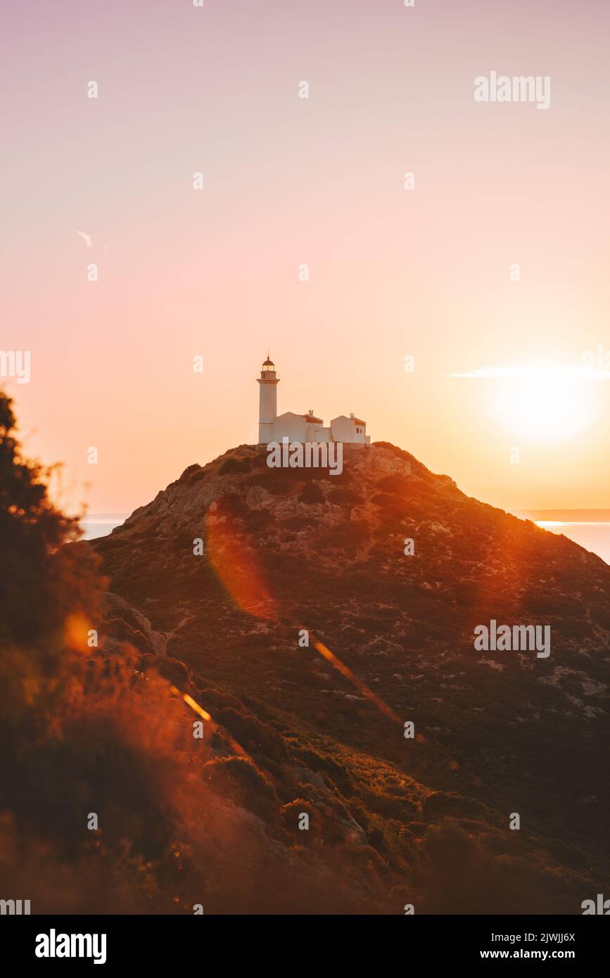Sunset Knidos Lighthouse on mountain above Aegean sea landscape travel ...