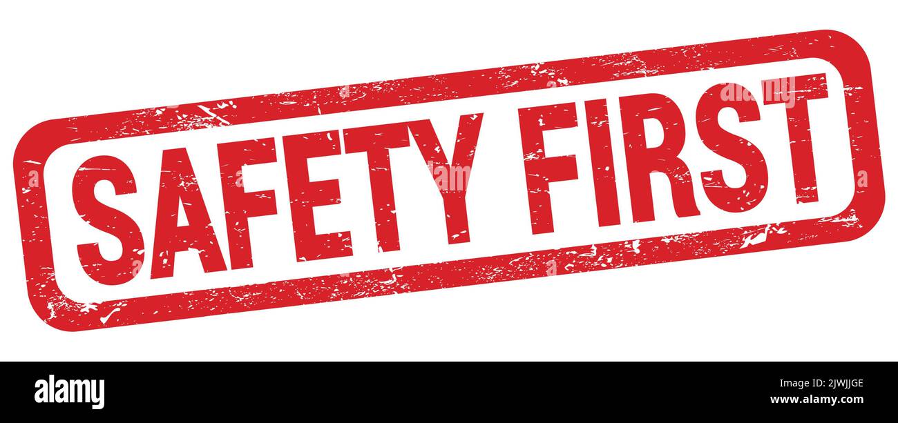 SAFETY FIRST text written on red rectangle stamp sign Stock Photo - Alamy