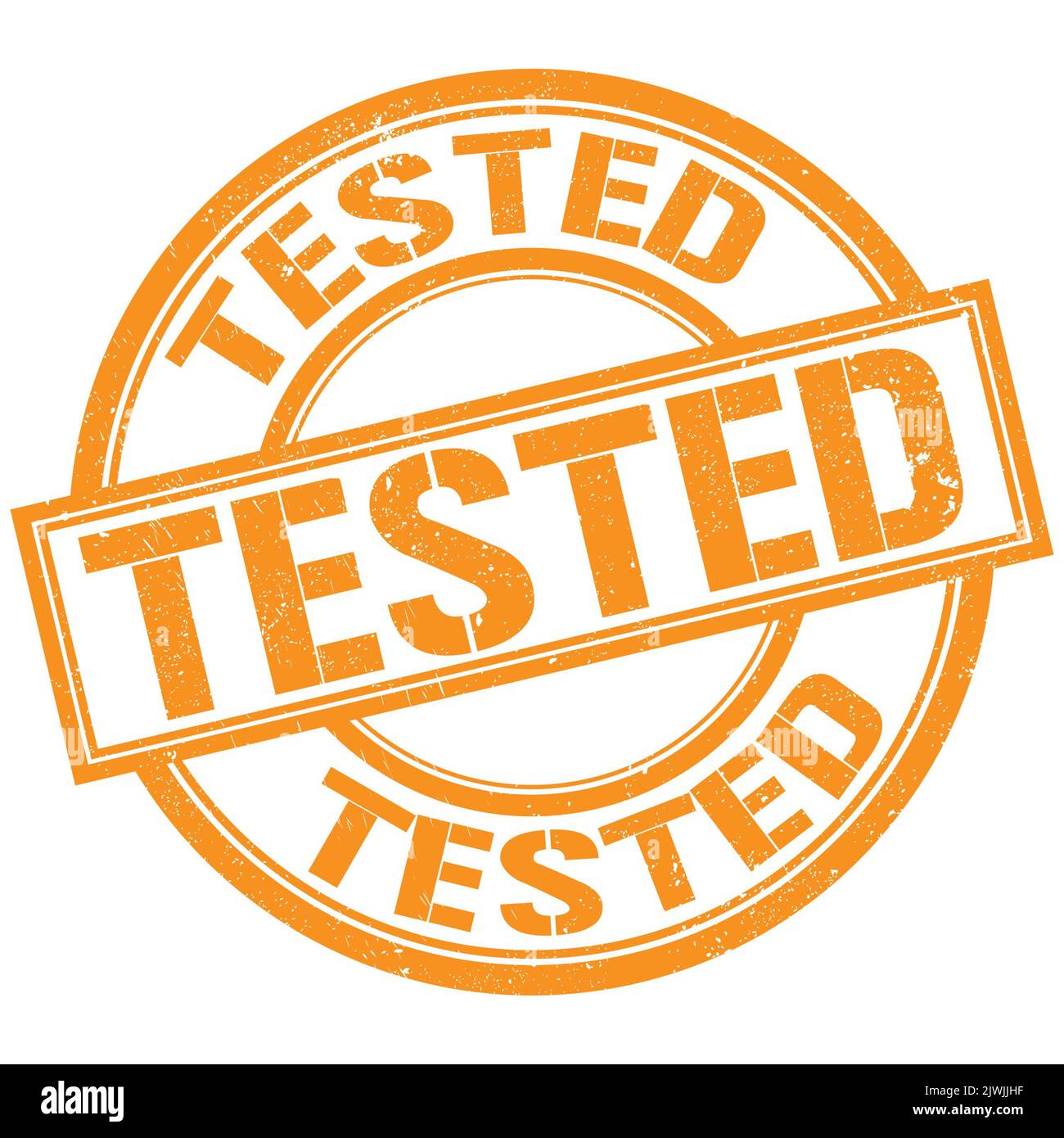 TESTED text written on orange round stamp sign Stock Photo - Alamy