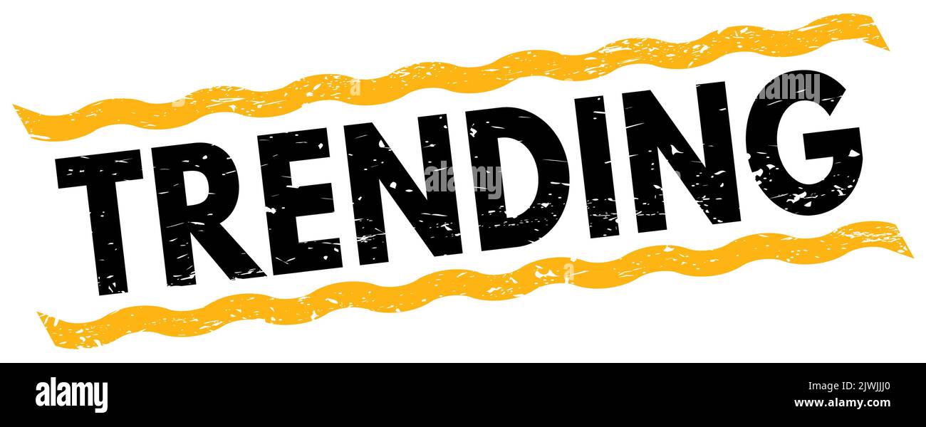 TRENDING text written on yellow-black lines stamp sign Stock Photo - Alamy