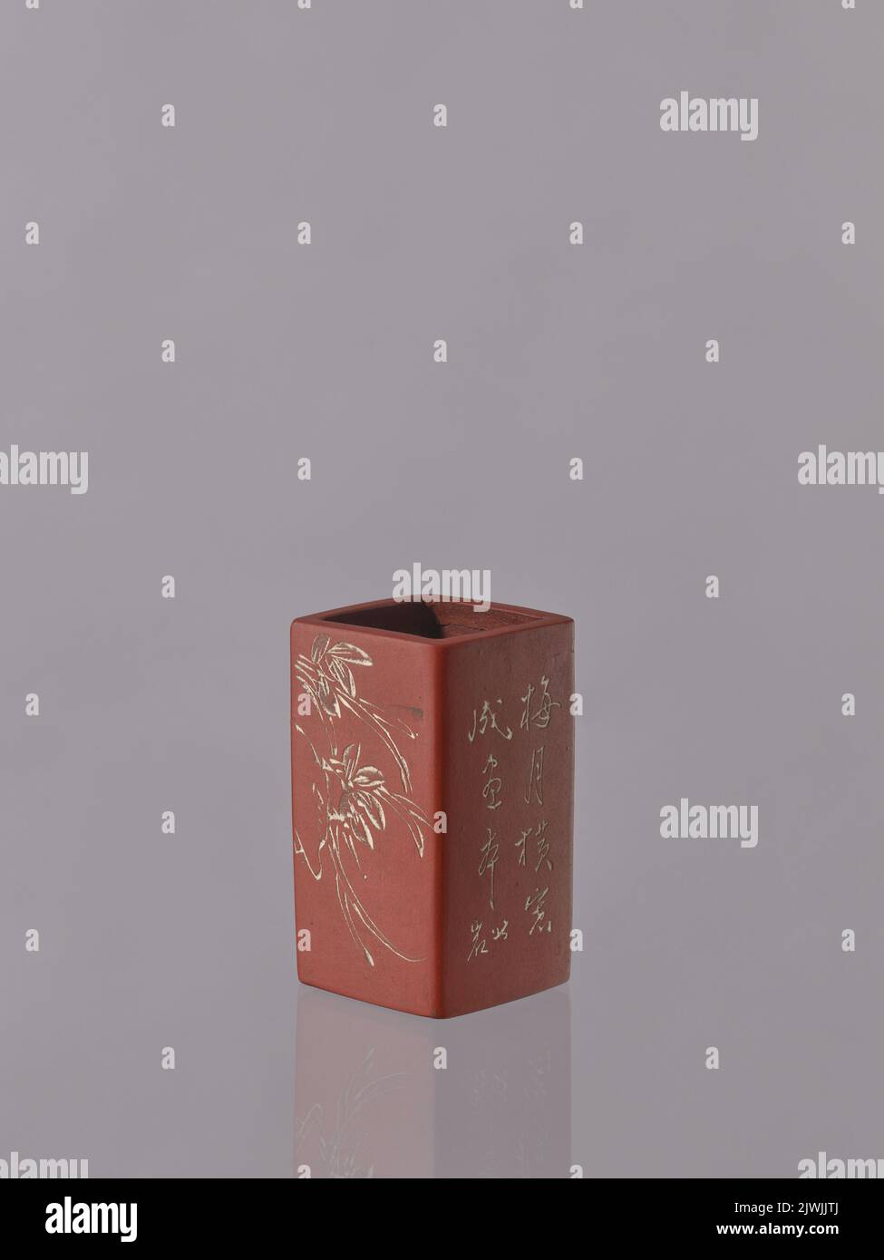 Rectangular utensil decorated on the walls with carved and whitened ...