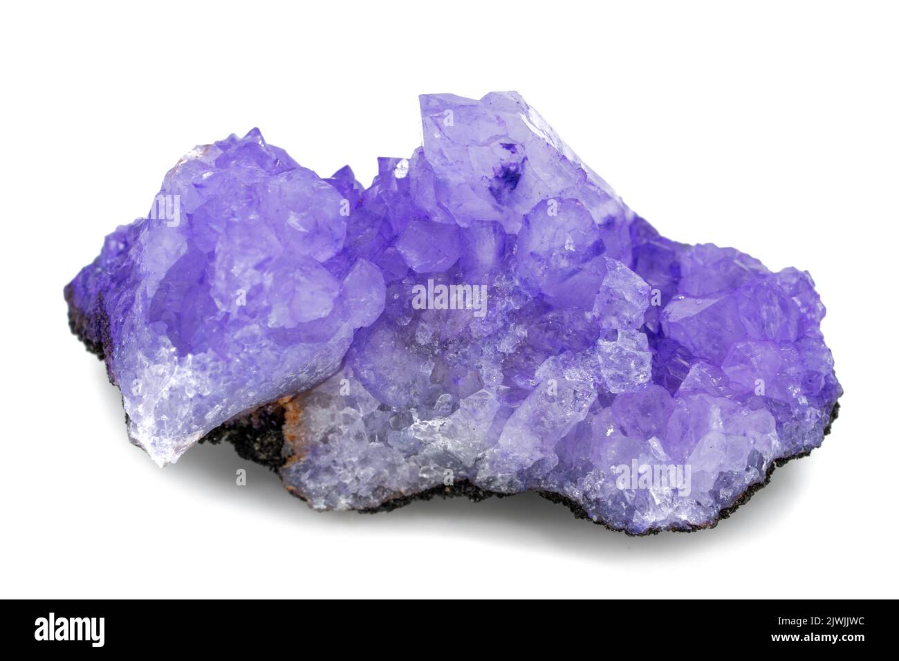Amethyst gemstone crystal isolated on white background Stock Photo - Alamy