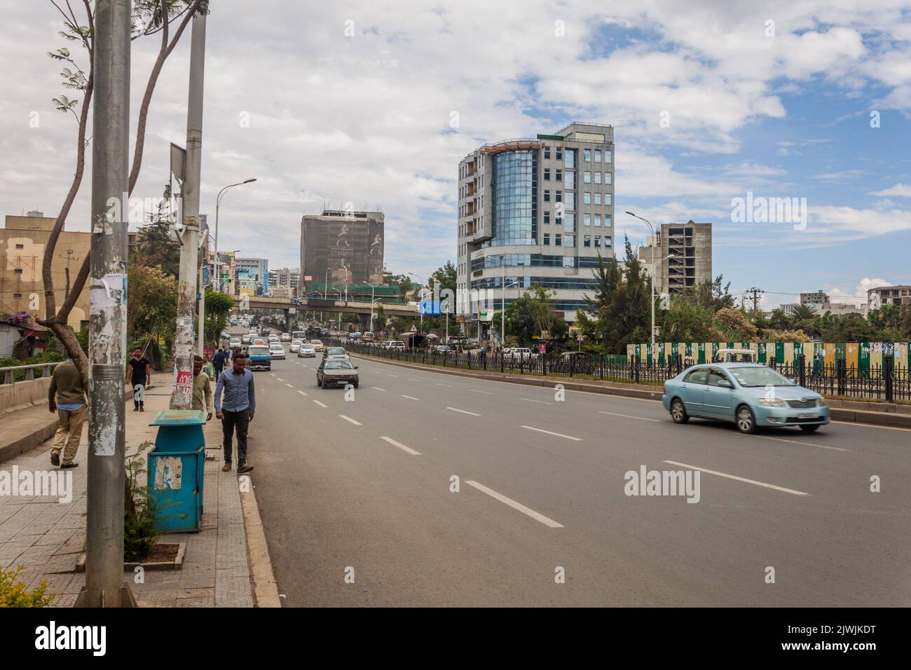 ADDIS ABABA, ETHIOPIA - APRIL 5, 2019: Road in the Bole nighborhood in Addis Ababa, Ethiopia ...