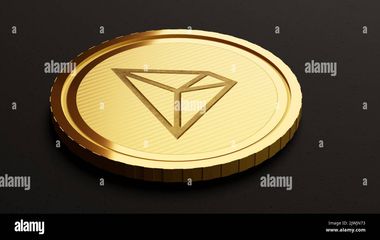 Tron TRX crypto coin in shape of golden metal coin on black background ...