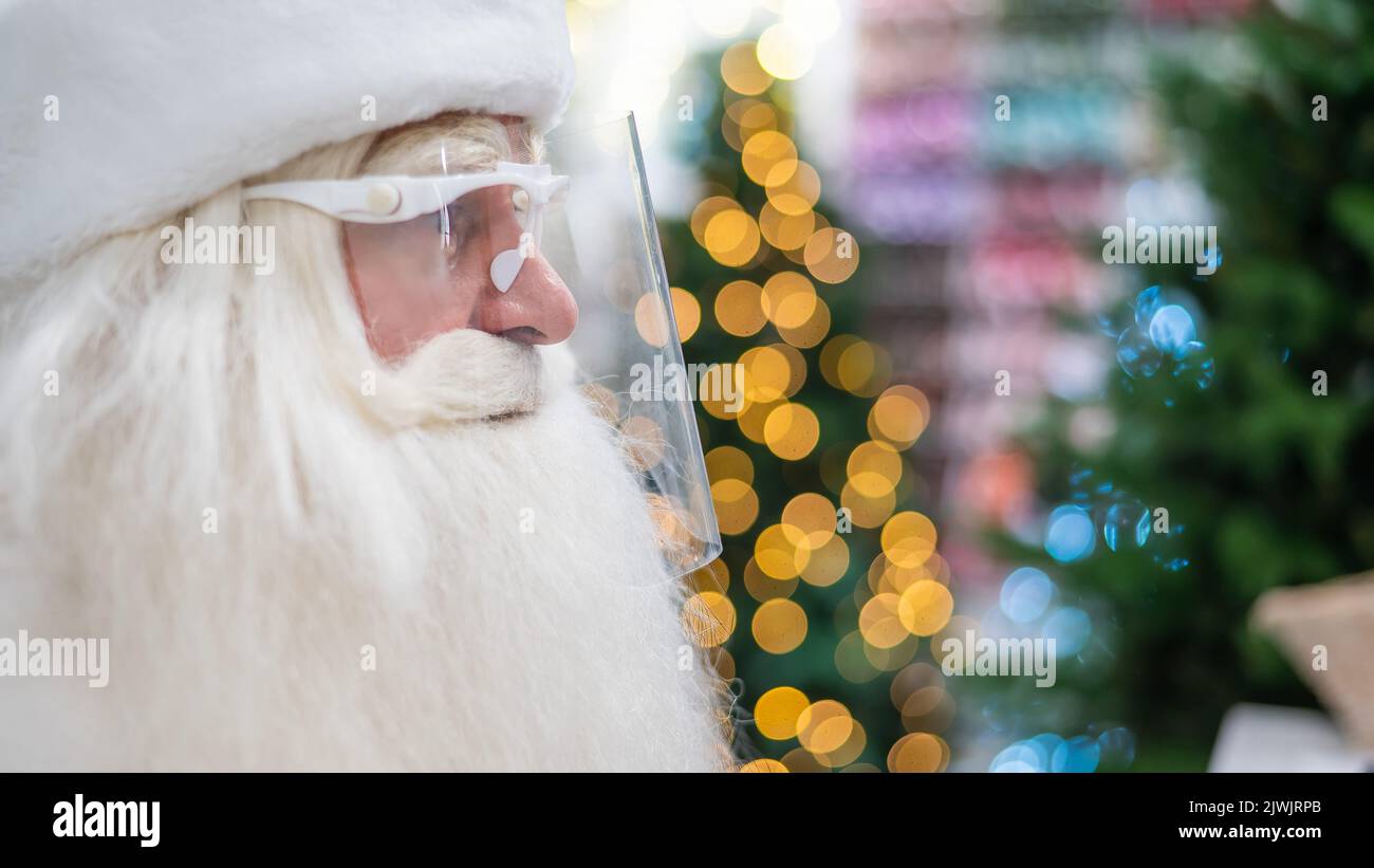 Portrait of russian santa claus in a protective visor Stock Photo - Alamy