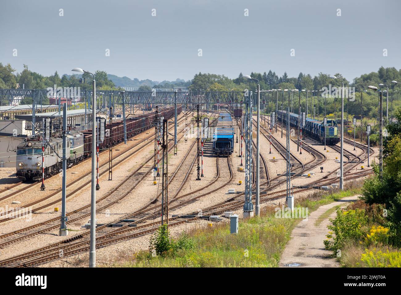 Distribution center, freight trains at the railway station Stock Photo ...